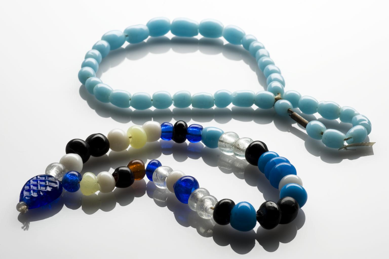 Glass necklace worn to prevent bronchitis, Chelsea, London, England ...