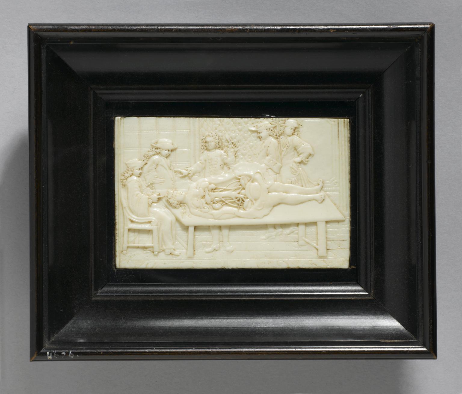 Ivory plaque showing a dissection scene in ebony frame, Europe, 1601 ...