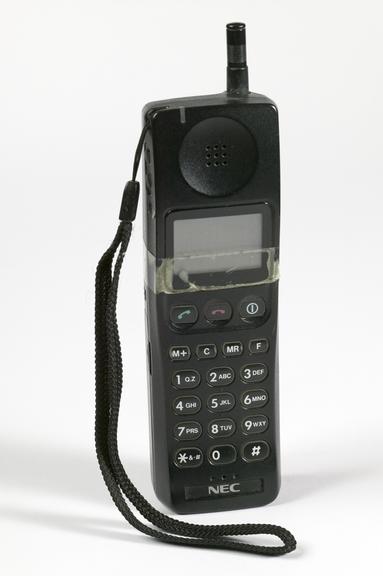 NEC Mobile Phone and Docking Station | Science Museum Group Collection