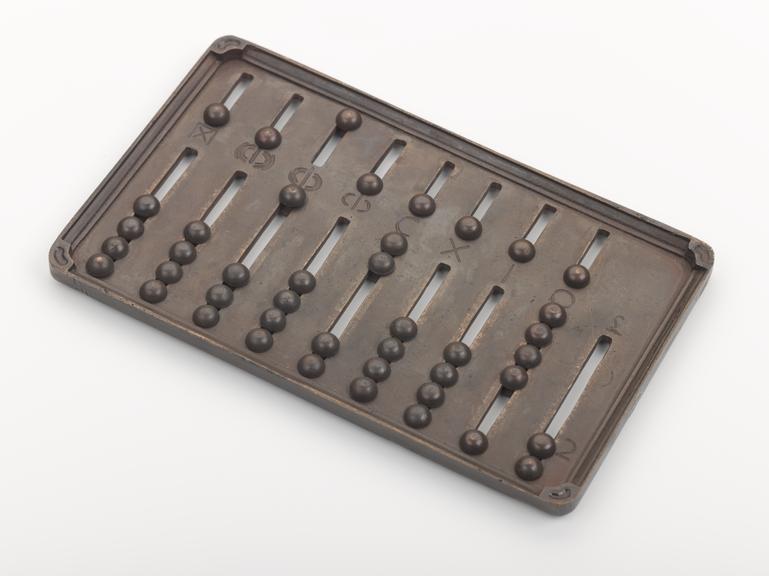 One of two replica Roman hand abaci. | Science Museum Group Collection