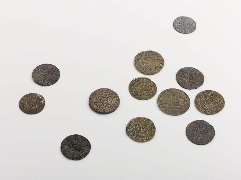 Twelve German jetons, 16th century. | Science Museum Group Collection