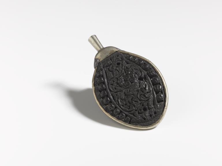Carved nut pomander, in metal mount | Science Museum Group Collection