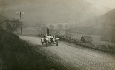 Photograph of a motor car in a race | Science Museum Group Collection