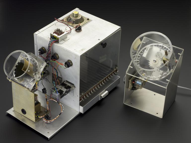 Operant conditioning chamber ("Skinner Box") with two feeding hoppers ...