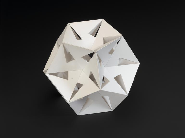 Polyhedron model showing the icosahedron and one of its 58 stellations ...