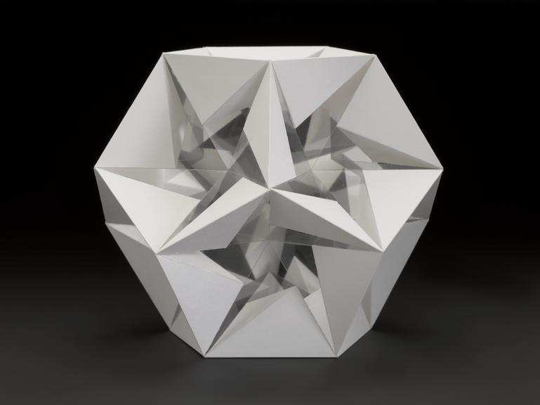 Polyhedron model showing the icosahedron and one of its 58 stellations ...