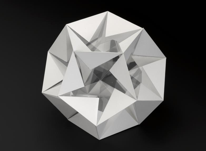 Polyhedron model showing the icosahedron and one of its 58 stellations ...