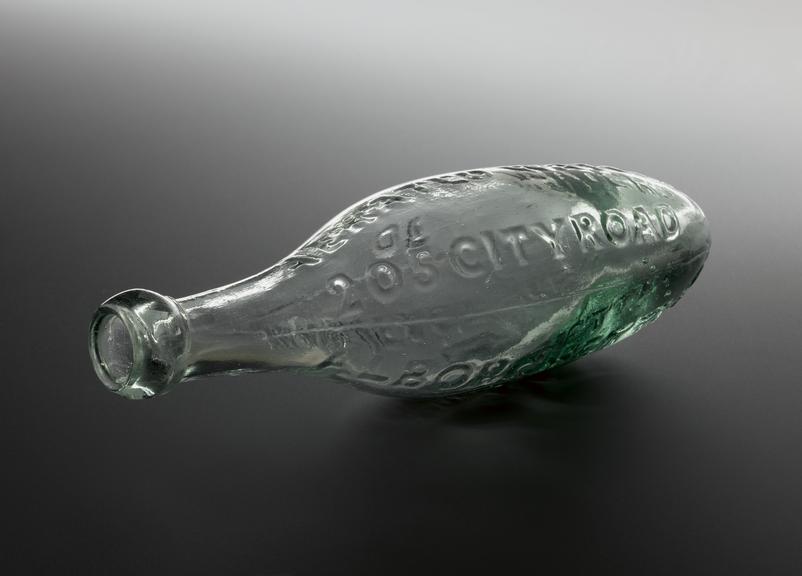 Oval shaped bottle embossed with the name Alborchetti & Co | Science ...