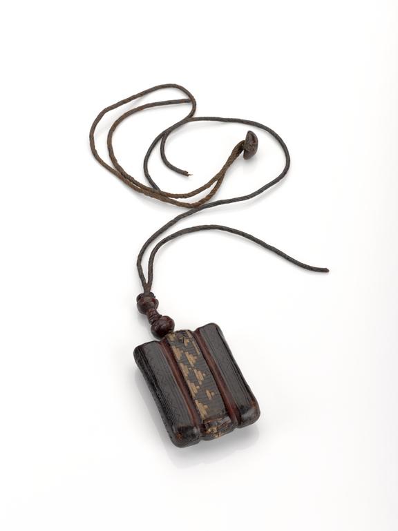 Leather amulet with decorative panel of woven leather and grass ...