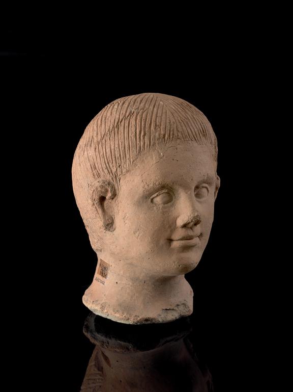Votive offering showing the head of a boy, Roman, 200 BCE-200 CE ...