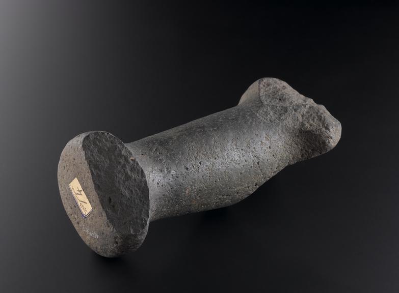 Double ended stone pounder with tapering centre stem and rounded ...