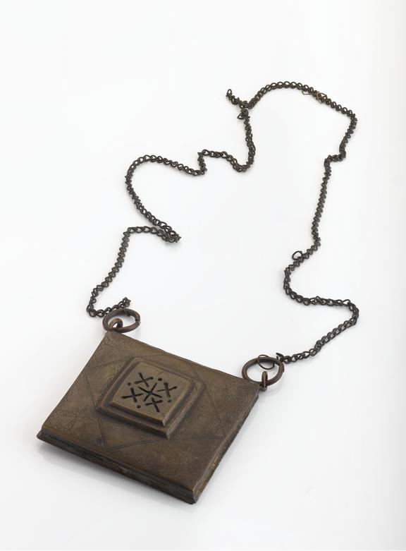 Rectangular brass amulet case | Science Museum Group Collection