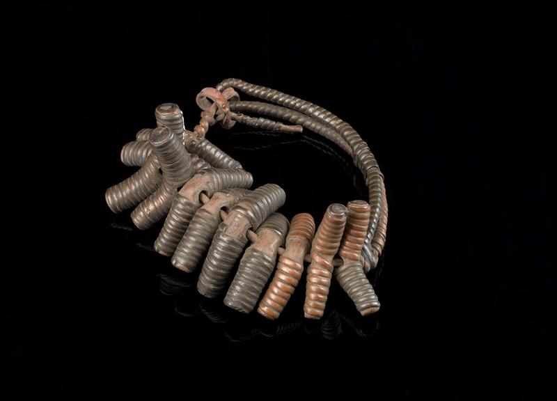 Hide bracelet bound with copper wire | Science Museum Group Collection