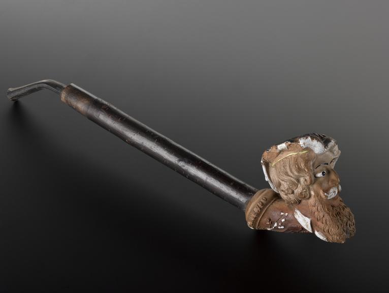 Clay stub-stem tobacco pipe with rosewood stem and horn mouthpiece ...