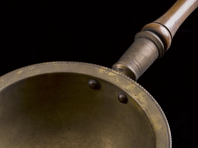 Brass vessel with wooden handle | Science Museum Group Collection