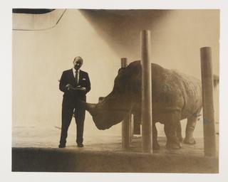 Photograph of World Wildlife Fund founder Peter Scott reading to a ...