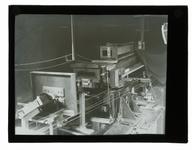 A glass slide of a spectroheliograph, plus a print of part of a ...