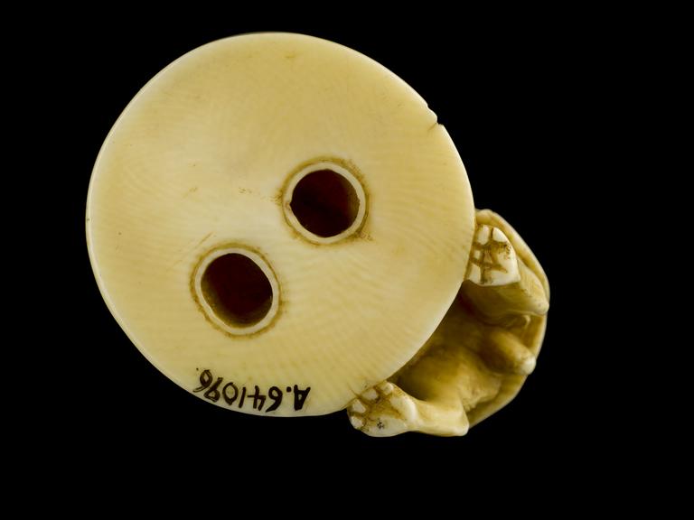 Netsuke in form of rabbit grinding with mortar and pestle | Science ...