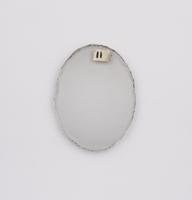 Oval smoke double concave spectacle lens | Science Museum Group Collection