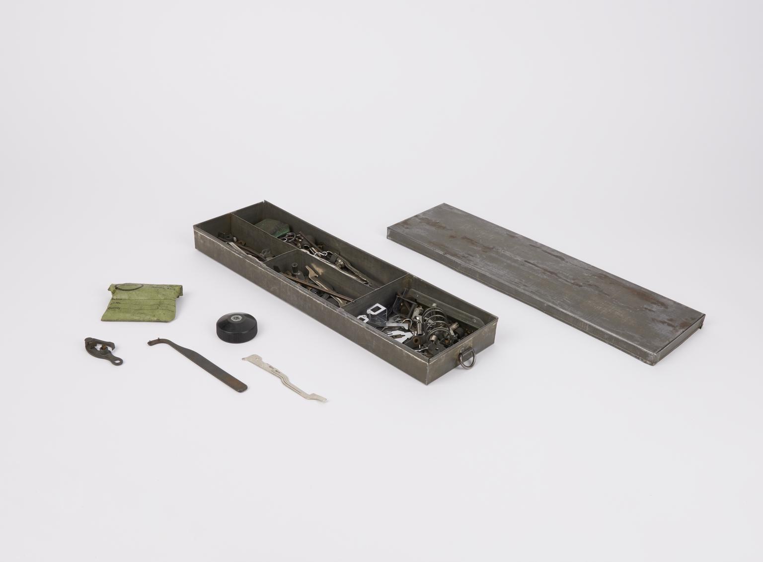 Two metal boxes, each containing a quantity of tools for repairing ...