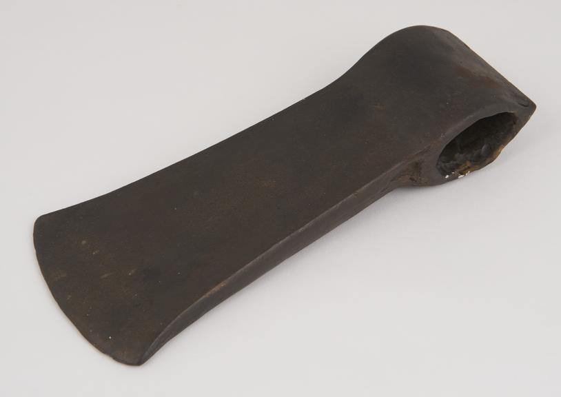 Plaster cast of bronze perforated axe | Science Museum Group Collection