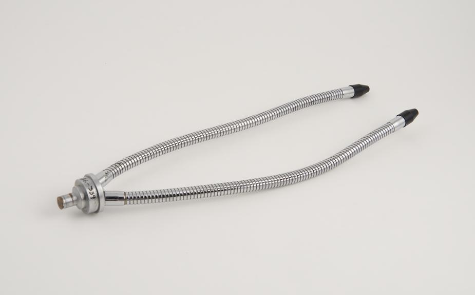 Y-guide in chrome-plated monocoil giving a gooseneck construction for ...