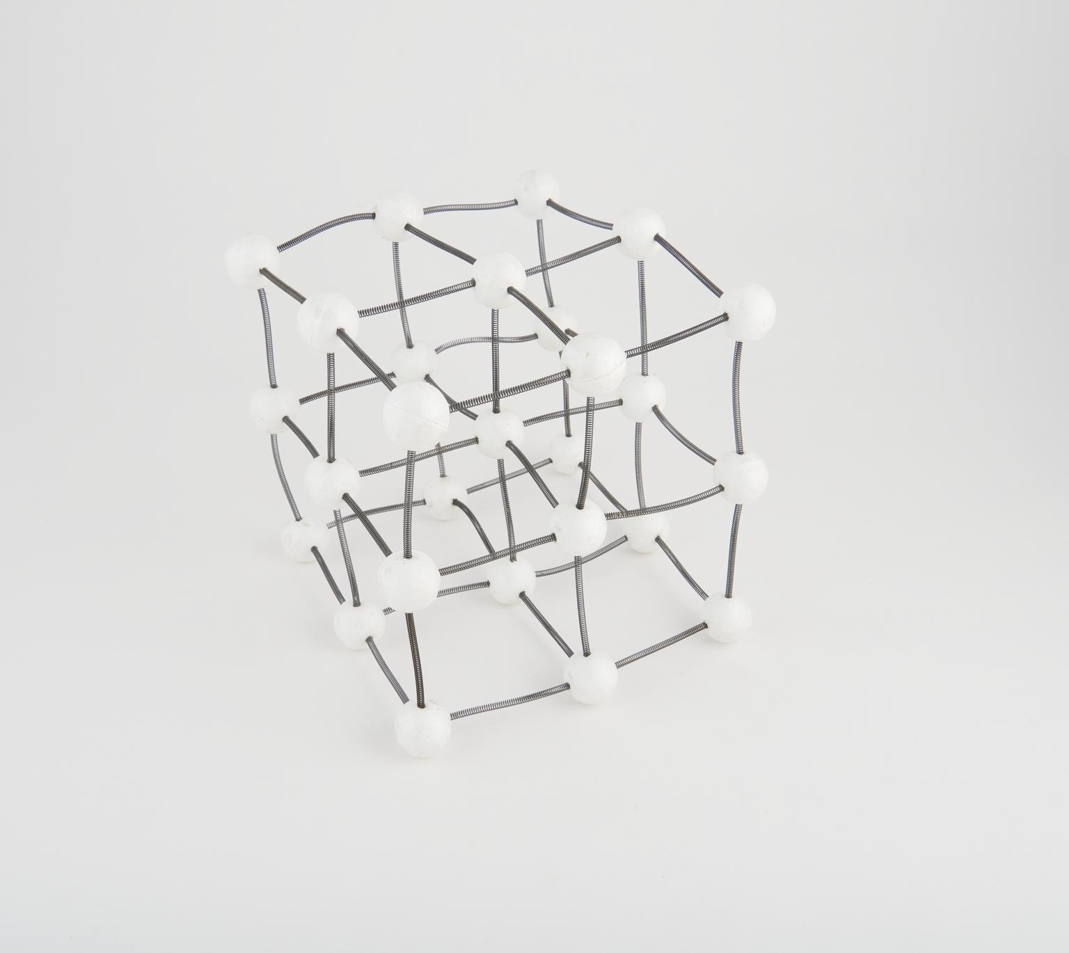 Model to demonstrate random vibrations of atoms in a crystal, c 1981 ...