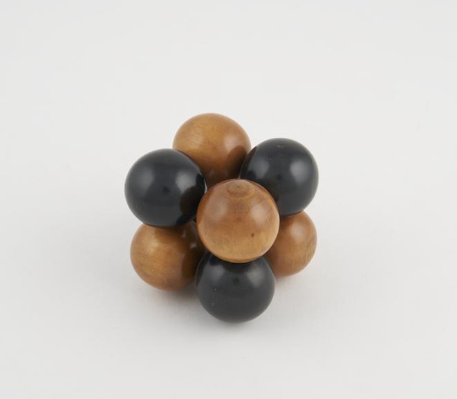 Crystal structure represented by an arrangement of four spheres ...