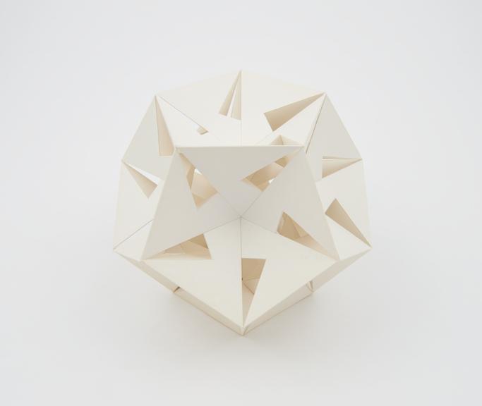 Polyhedron model showing the icosahedron and one of its 58 stellations ...