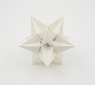 Polyhedron model showing the icosahedron and one of its 58 stellations ...