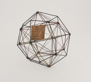 Crystal structure represented by a wire right square prism with three ...