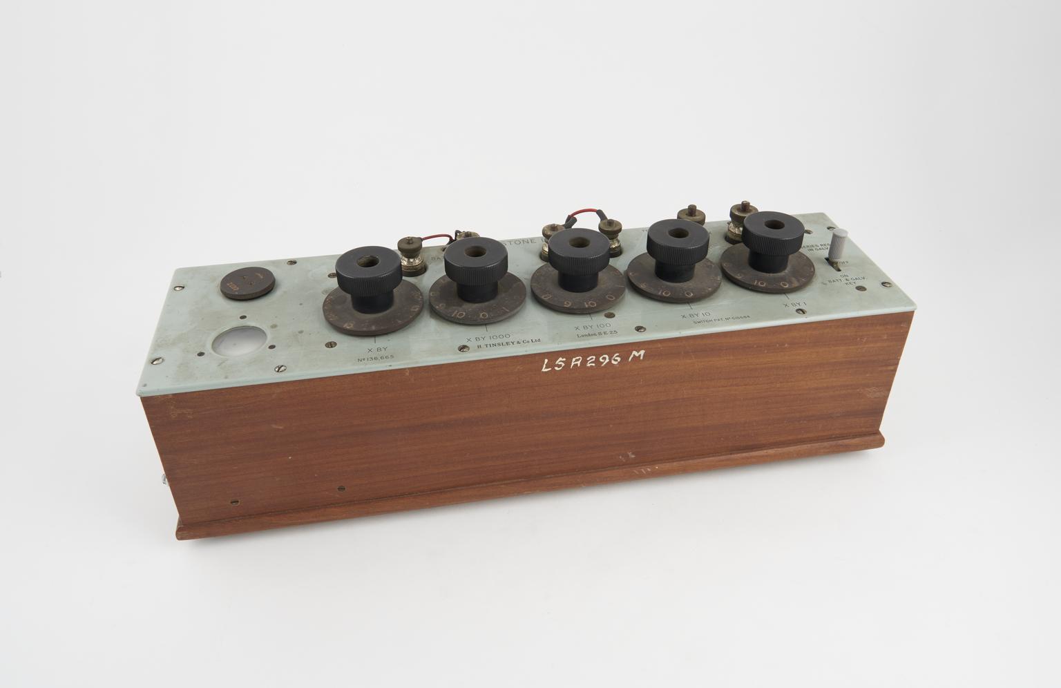 Wheatstone bridge with battery compartment and galvanometer built in ...
