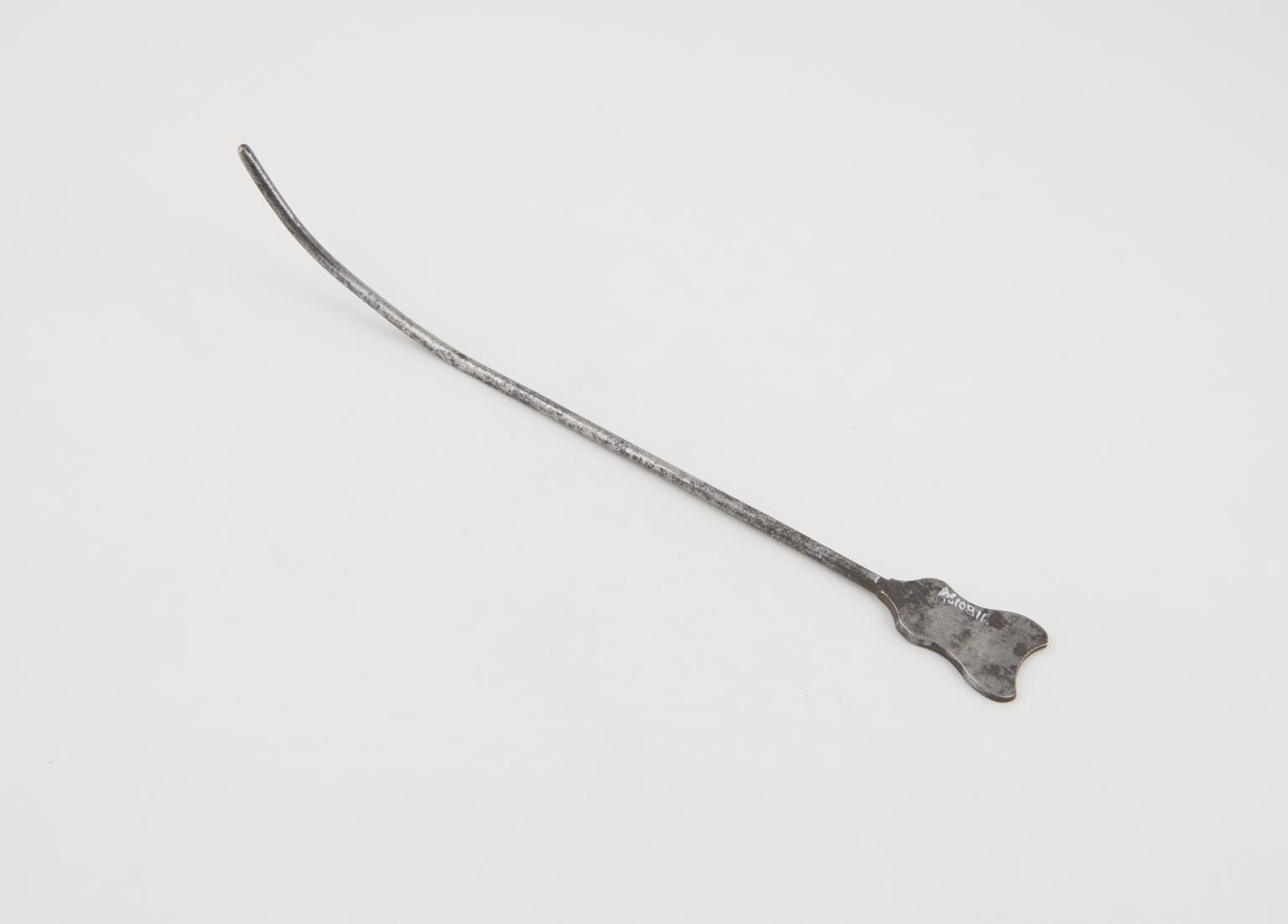 Small curved lithotomy staff with median groove and flat handle ...