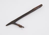 Shell blade lashed to a wooden heft | Science Museum Group Collection