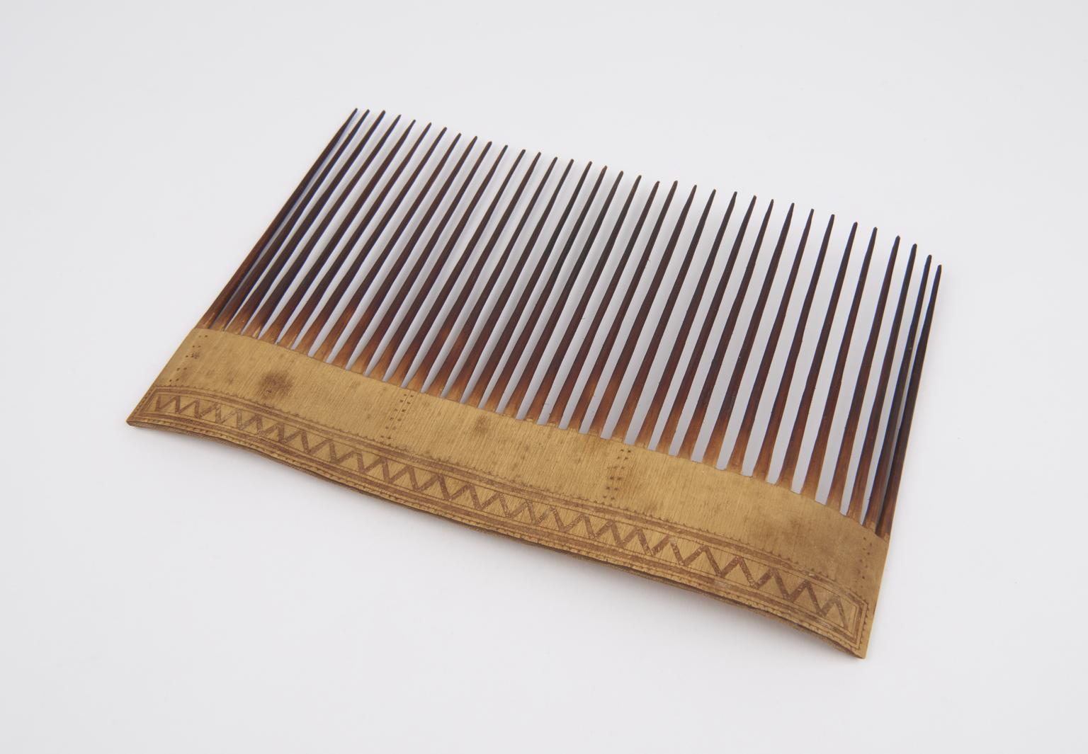 Large ornamental comb made of bamboo with carved edge to handle ...
