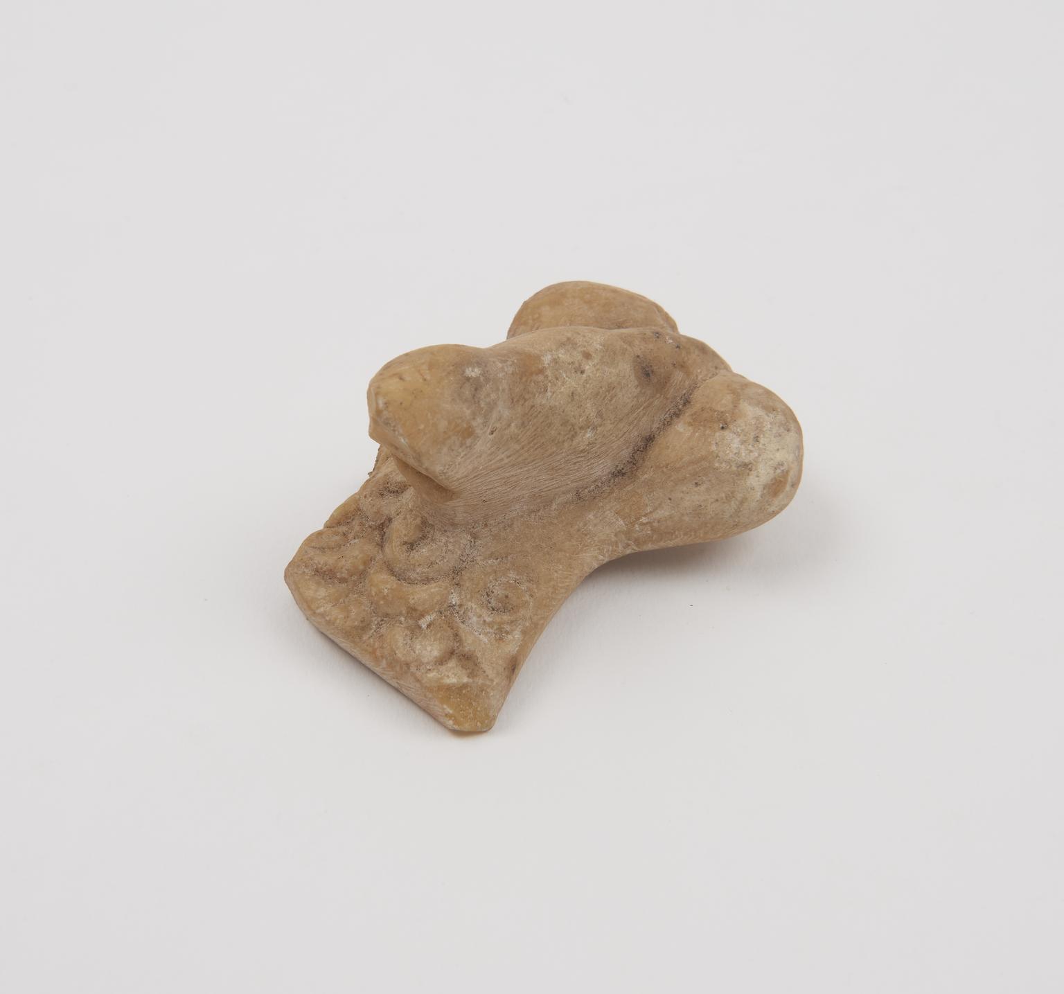 Votive offering consisting of marble relief of priapic male genitalia ...