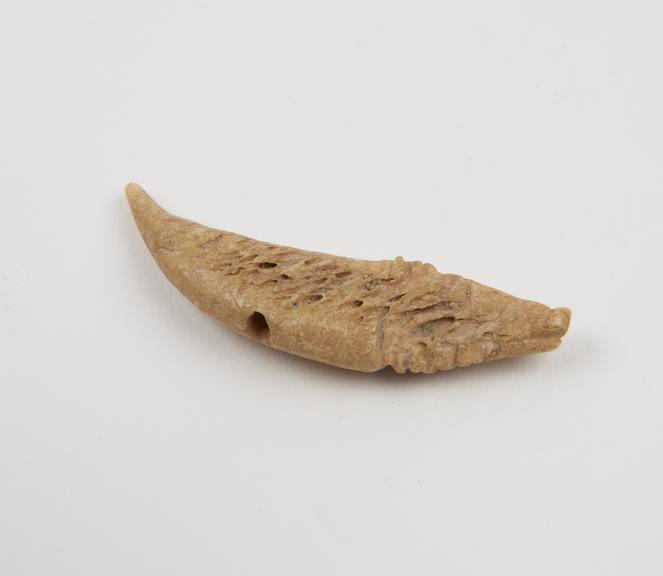 Amuletic bone pendant | Science Museum Group Collection