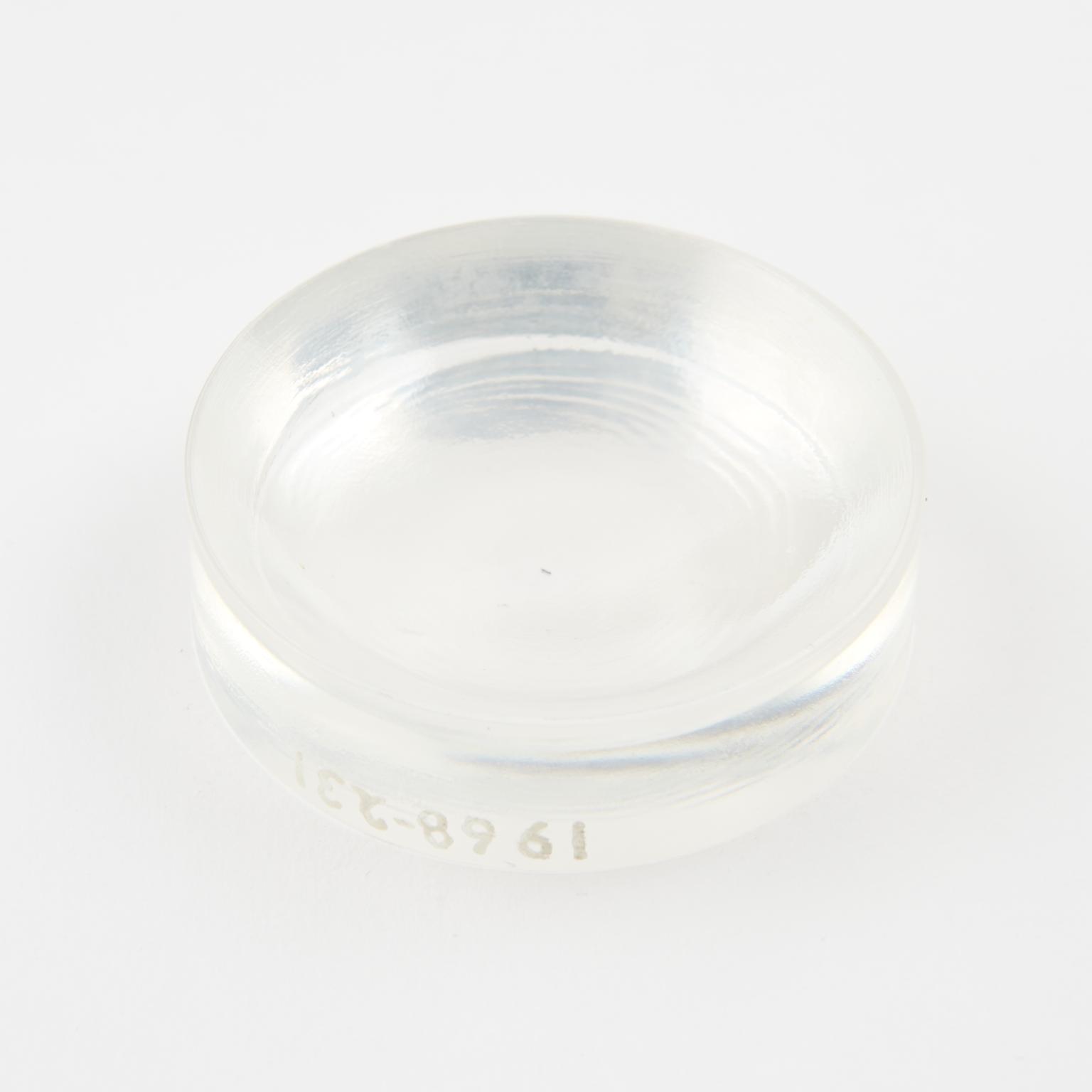 Four optical lens blanks, 1968 | Science Museum Group Collection