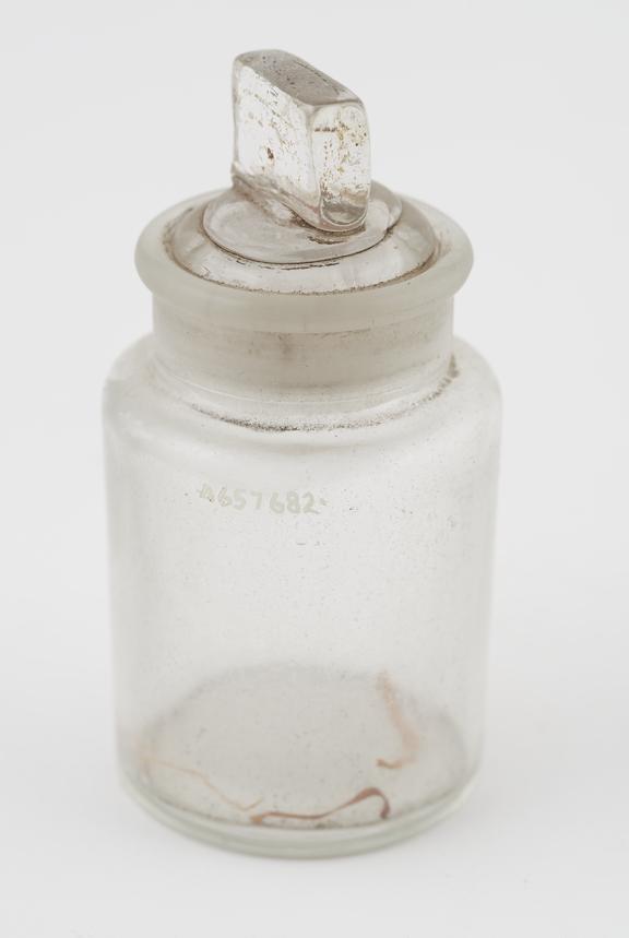 Clear glass cylindrical bottle | Science Museum Group Collection