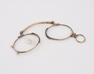 Folding eyeglasses with oval lenses and band spring | Science Museum ...