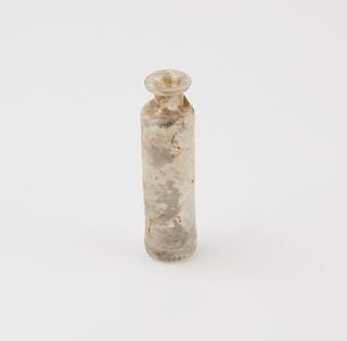 Glass bottle, cylindrical, weathered | Science Museum Group Collection