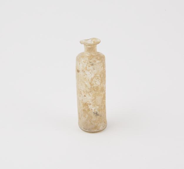 Cylindrical iridescent white glass bottle | Science Museum Group Collection