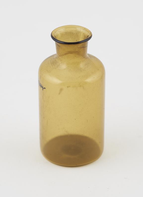 Small cylindrical amber glass bottle | Science Museum Group Collection