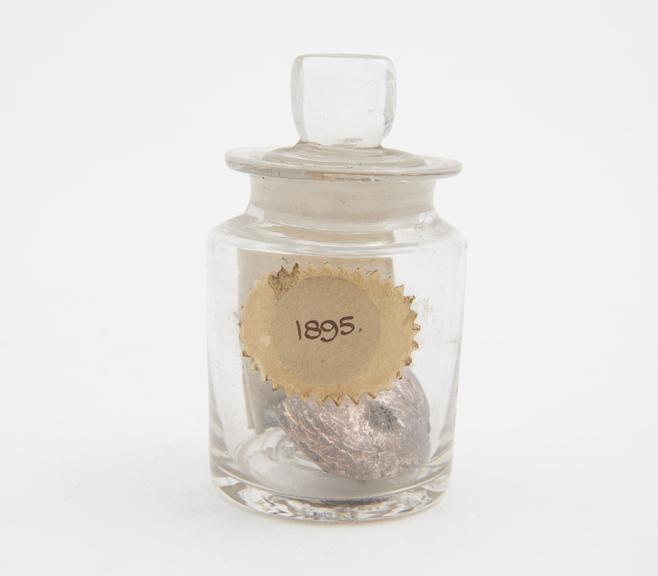 Purified silver in the form of a button | Science Museum Group Collection