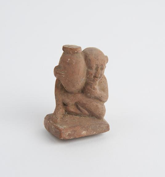 Small terracotta child-like figure | Science Museum Group Collection