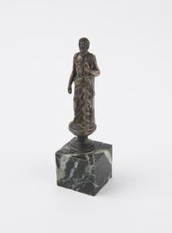 Small metal statue of Aesculapius | Science Museum Group Collection