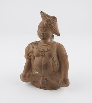 Statue of squatting man | Science Museum Group Collection