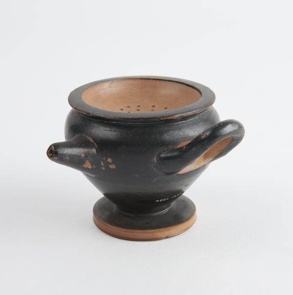 Earthenware feeding bottle or strainer= | Science Museum Group Collection