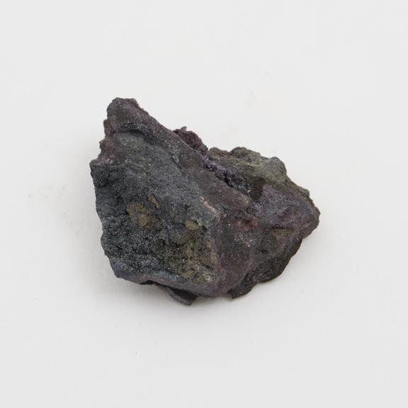 Crystals of arseniate of copper formed in a furnace bottom on a metal ...