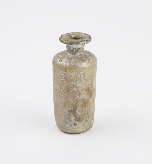 Pale green glass bottle, irridescent cylindrical | Science Museum Group ...